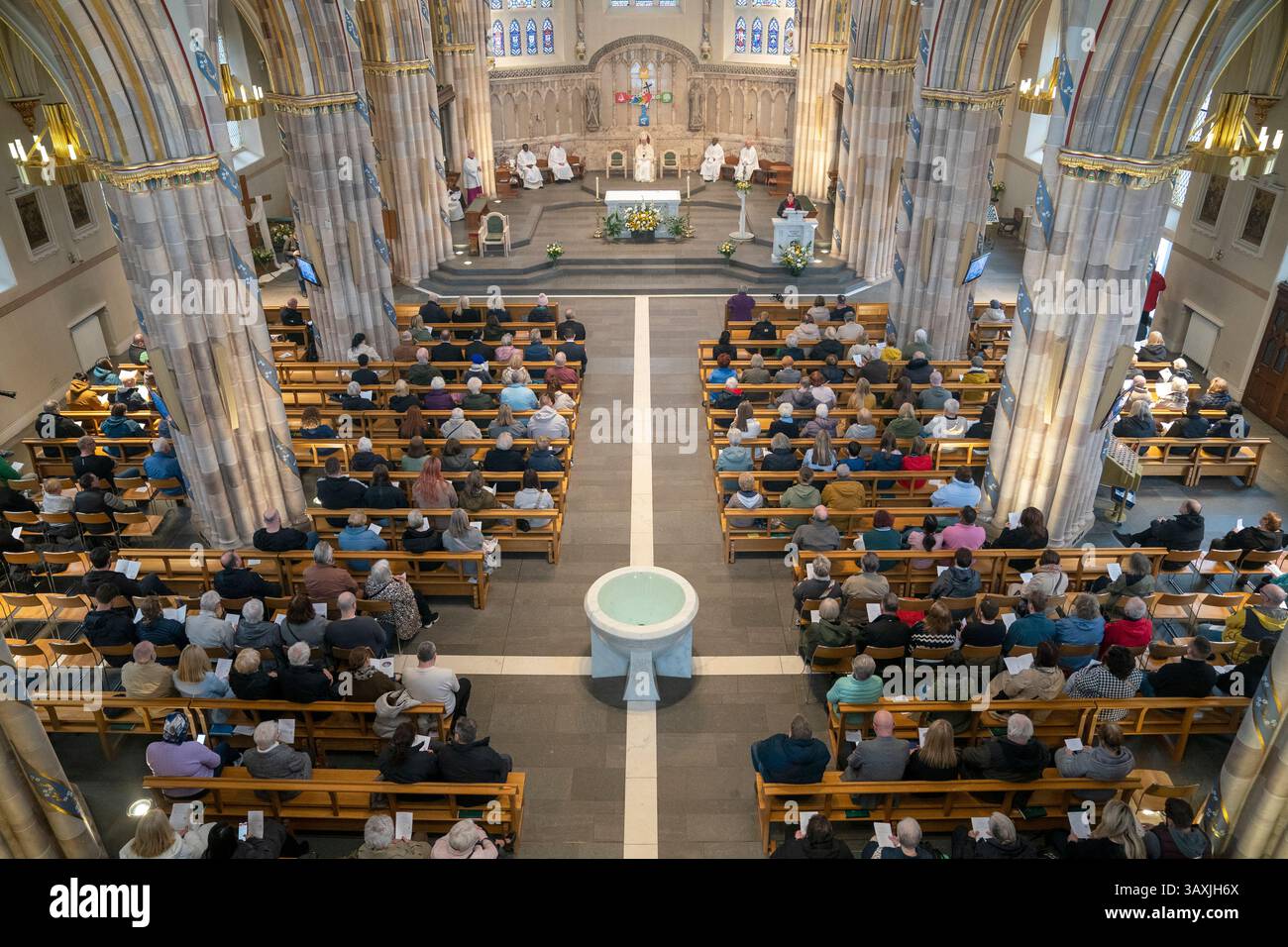 Members of the congregation during a special Easter Monday Mass at St ...