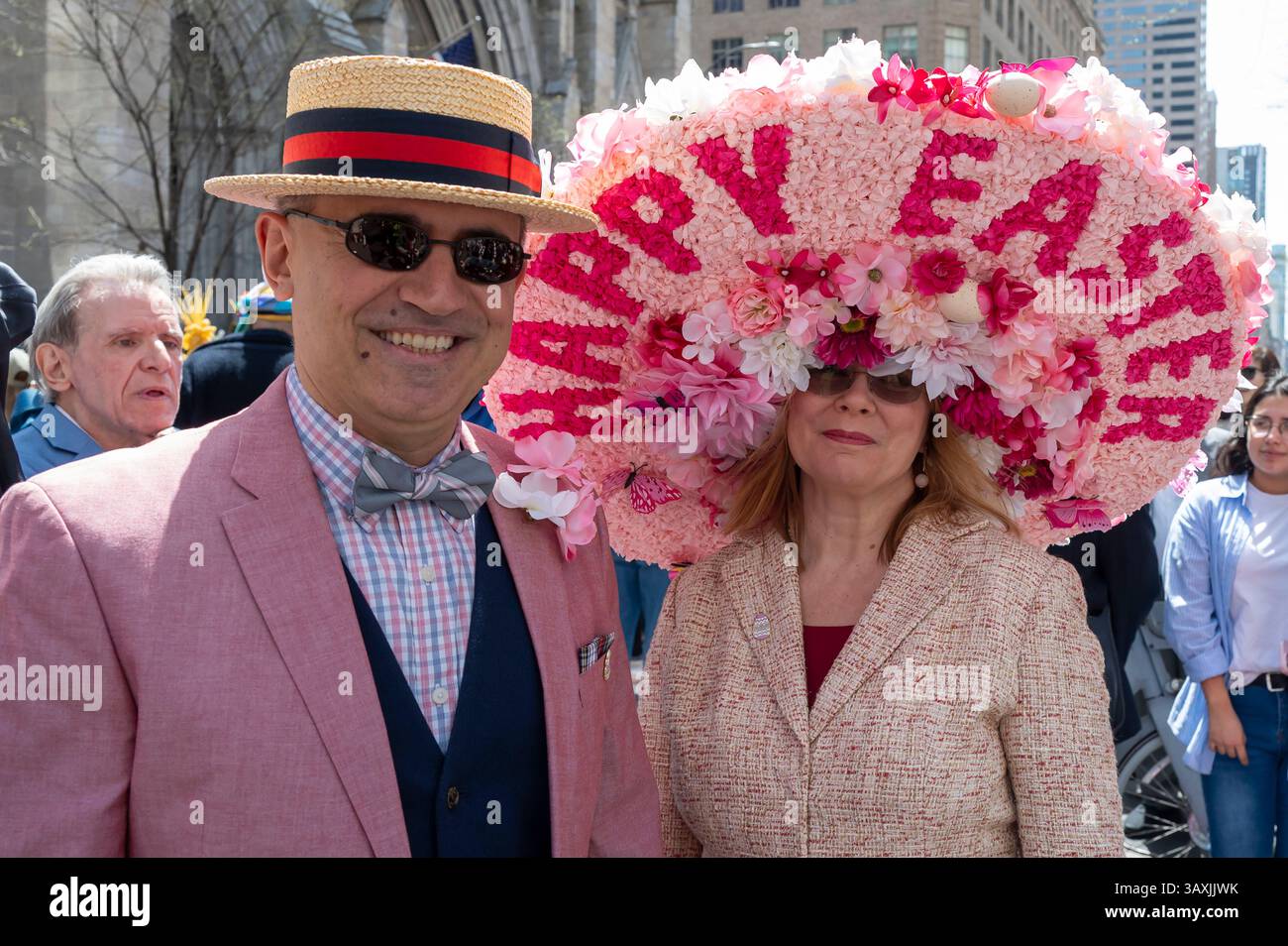 People participate with colorful costumes and hats at the annual Easter ...