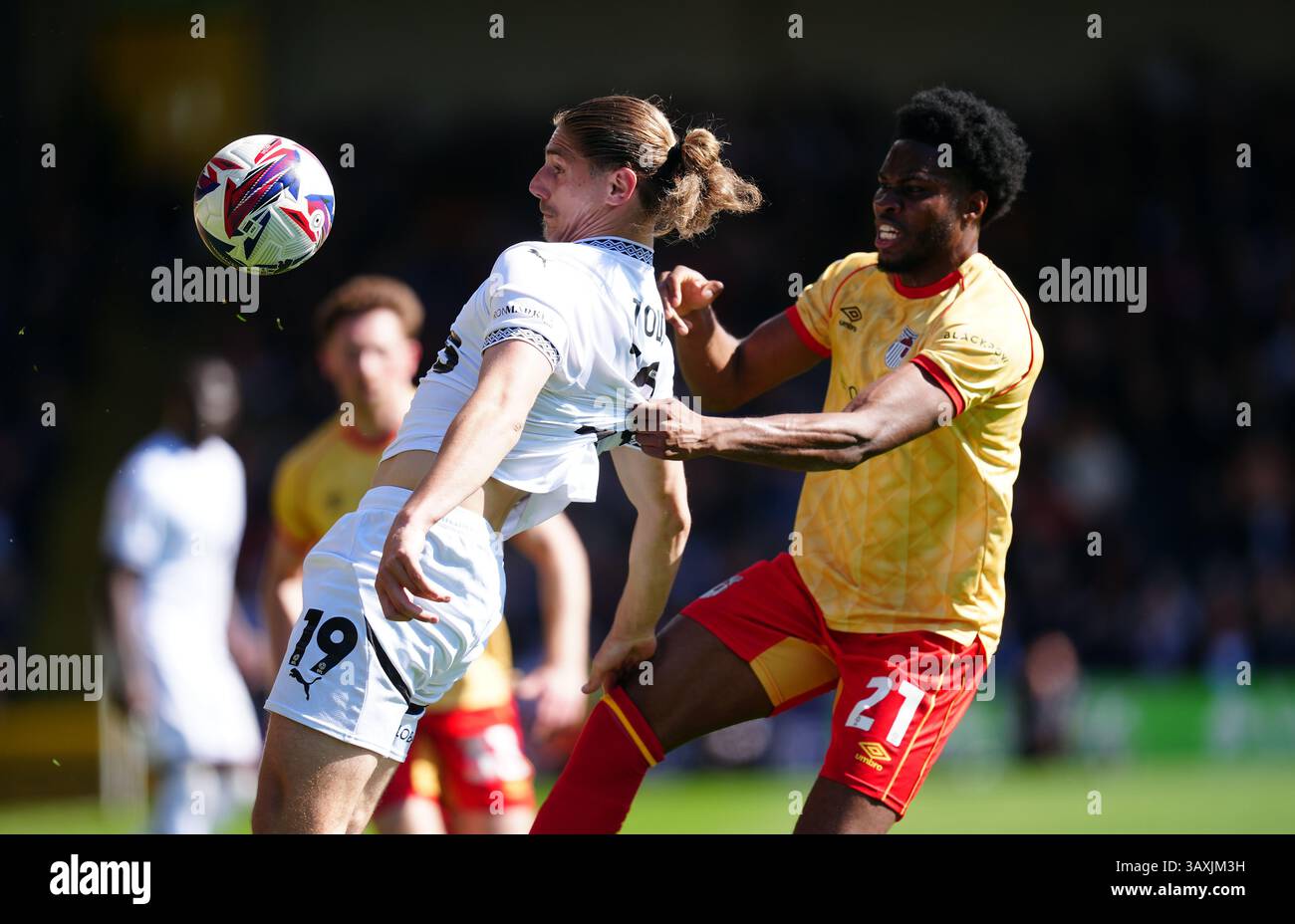 Port Vale's Lorent Tolaj and Grimsby Town's Tyrell Warren (right ...