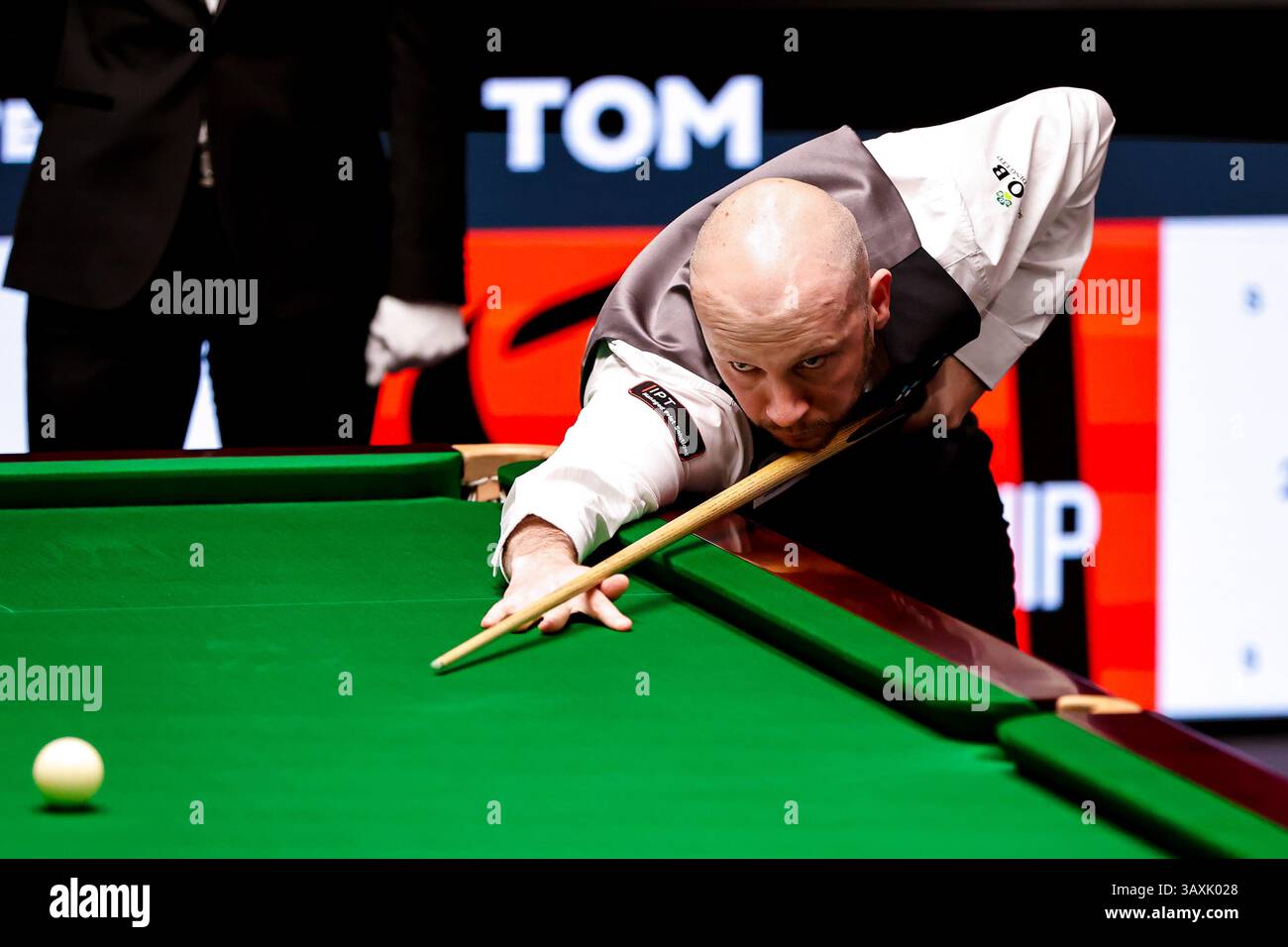 Sheffield, UK. 21st Apr, 2025. Zak Surety prepares a shot during the ...