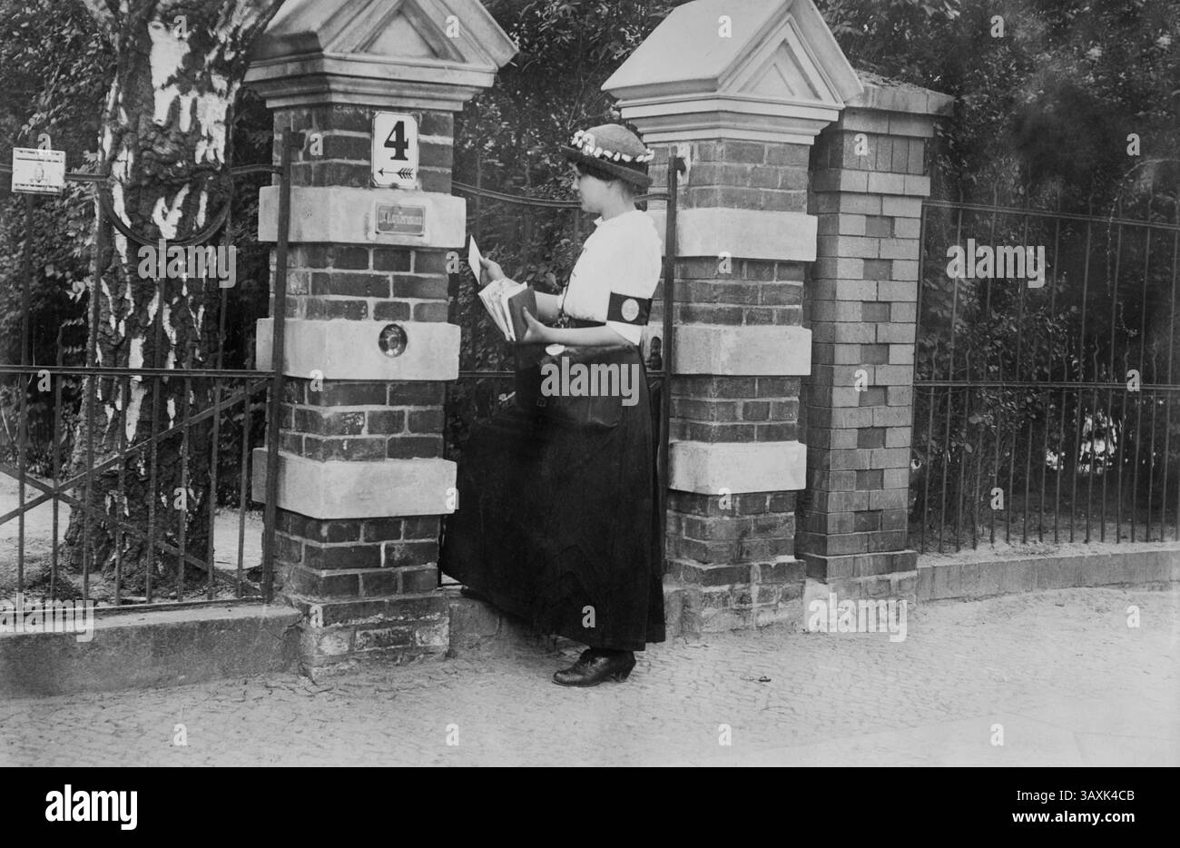 Woman postal worker germany Black and White Stock Photos & Images - Alamy