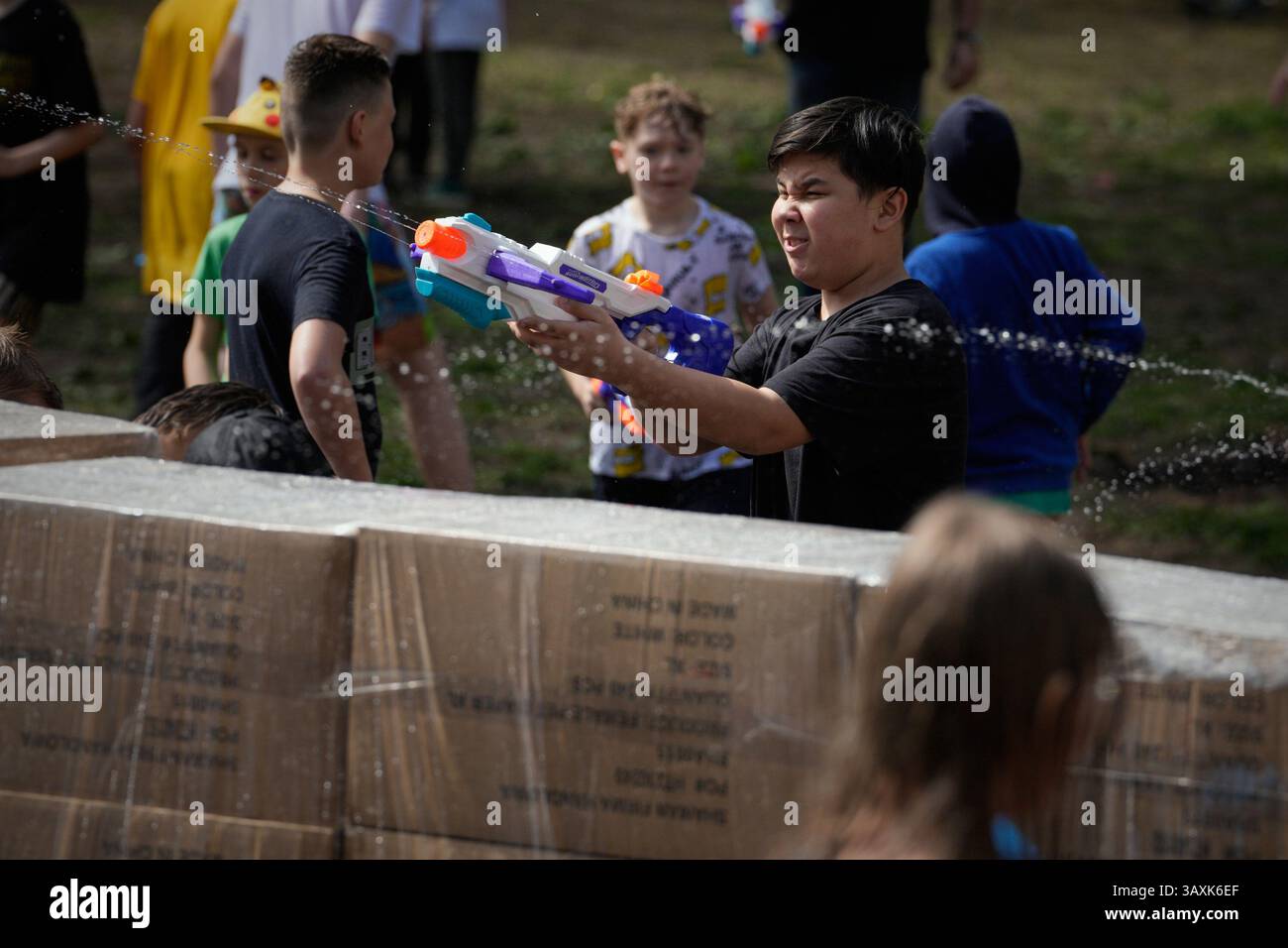 Lodz, Poland. 21st Apr, 2025. People take part in the traditional Wet ...