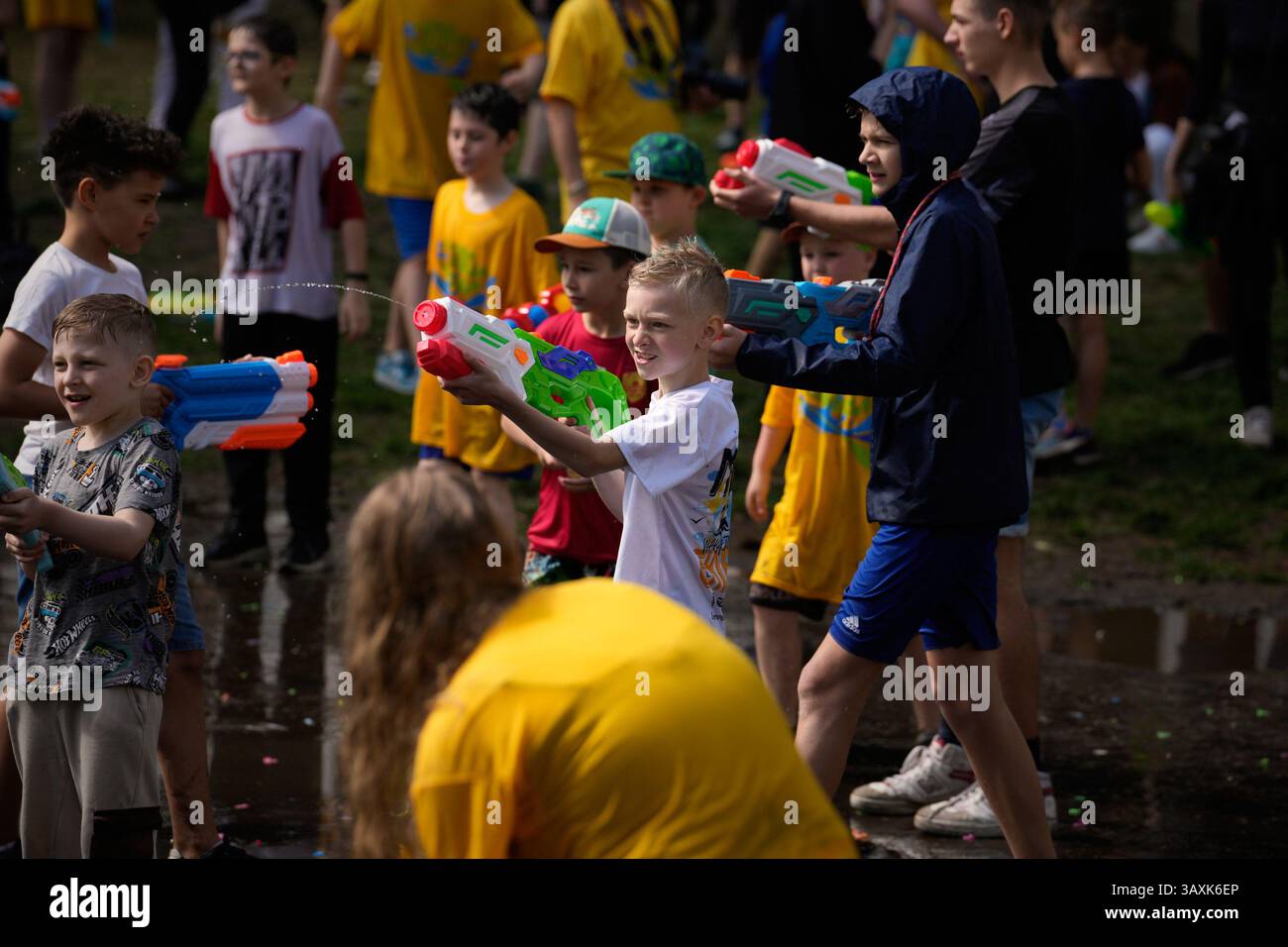 Lodz, Poland. 21st Apr, 2025. People take part in the traditional Wet ...