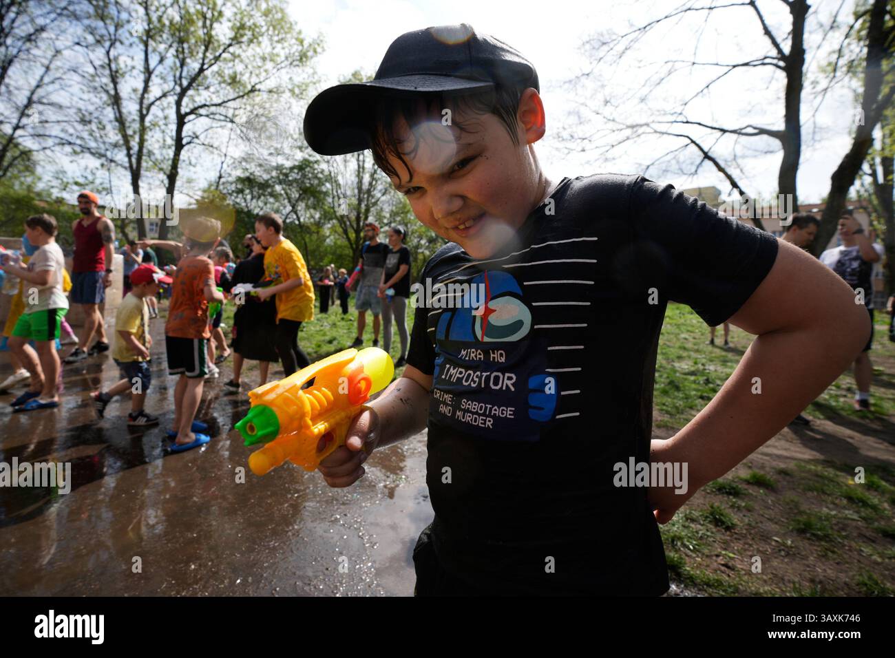 Lodz, Poland. 21st Apr, 2025. People take part in the traditional Wet ...