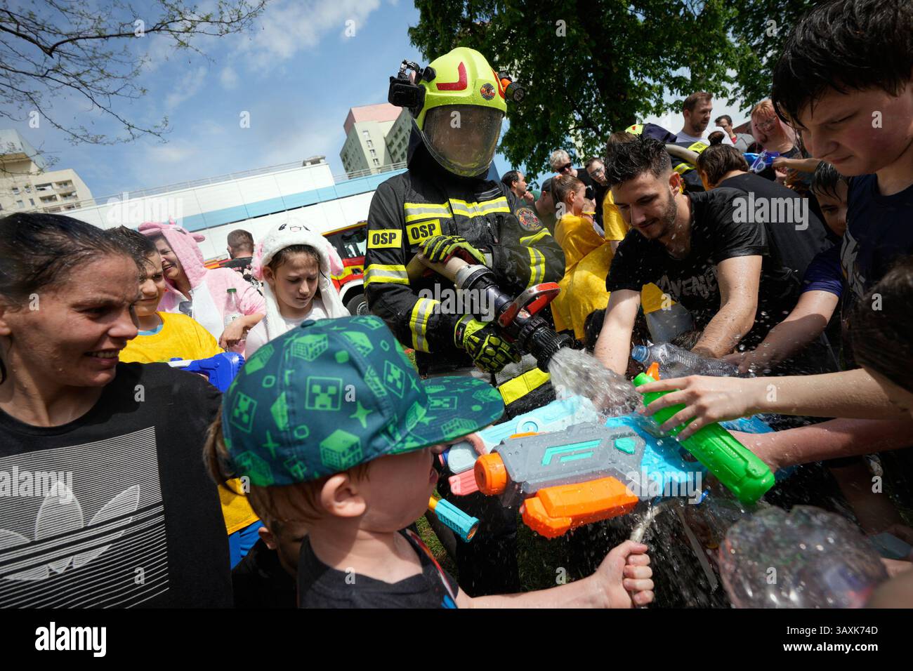 Lodz, Poland. 21st Apr, 2025. People take part in the traditional Wet ...