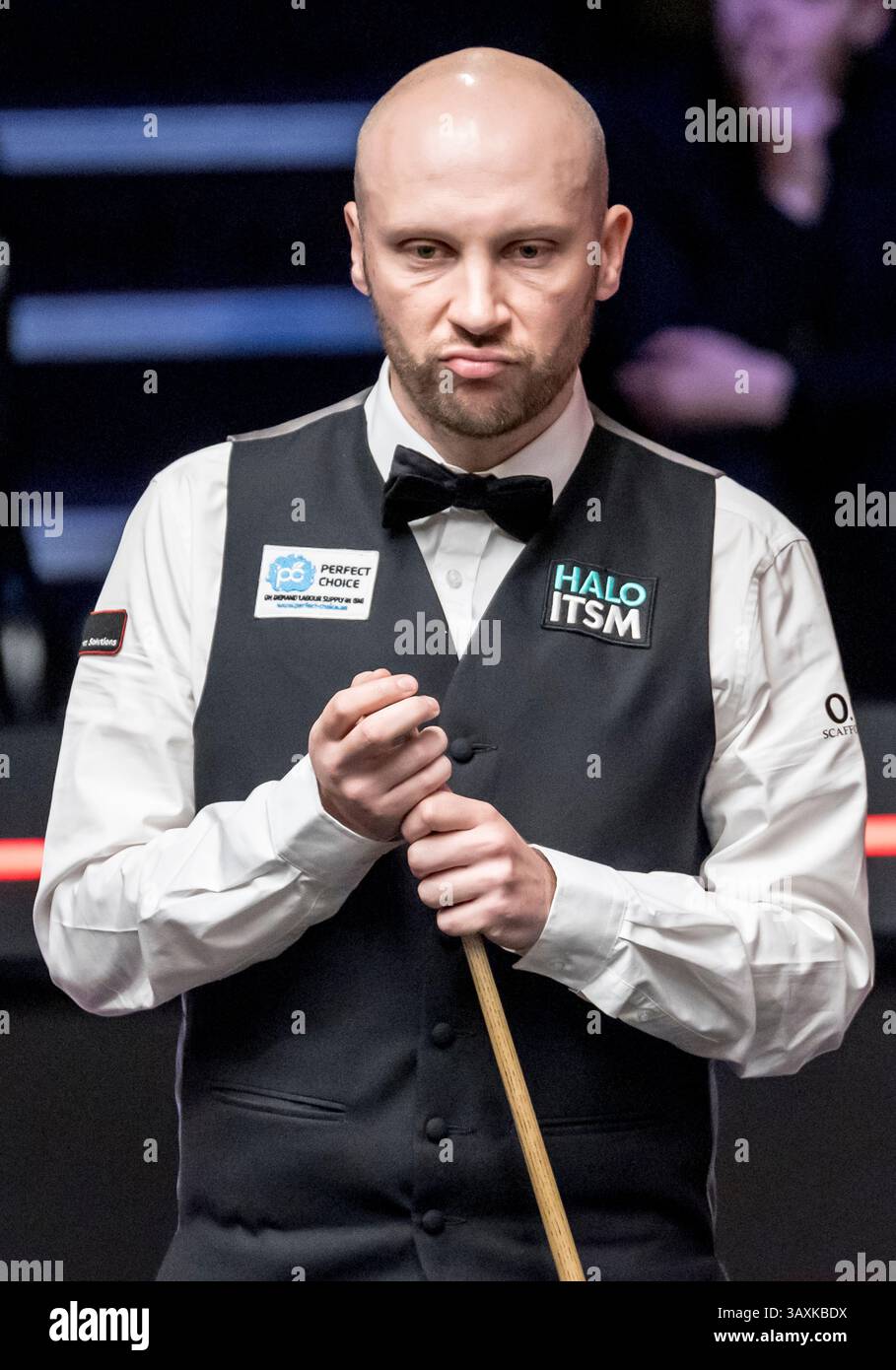 Zak Surety during his match against Ding Junhui (not pictured), during ...