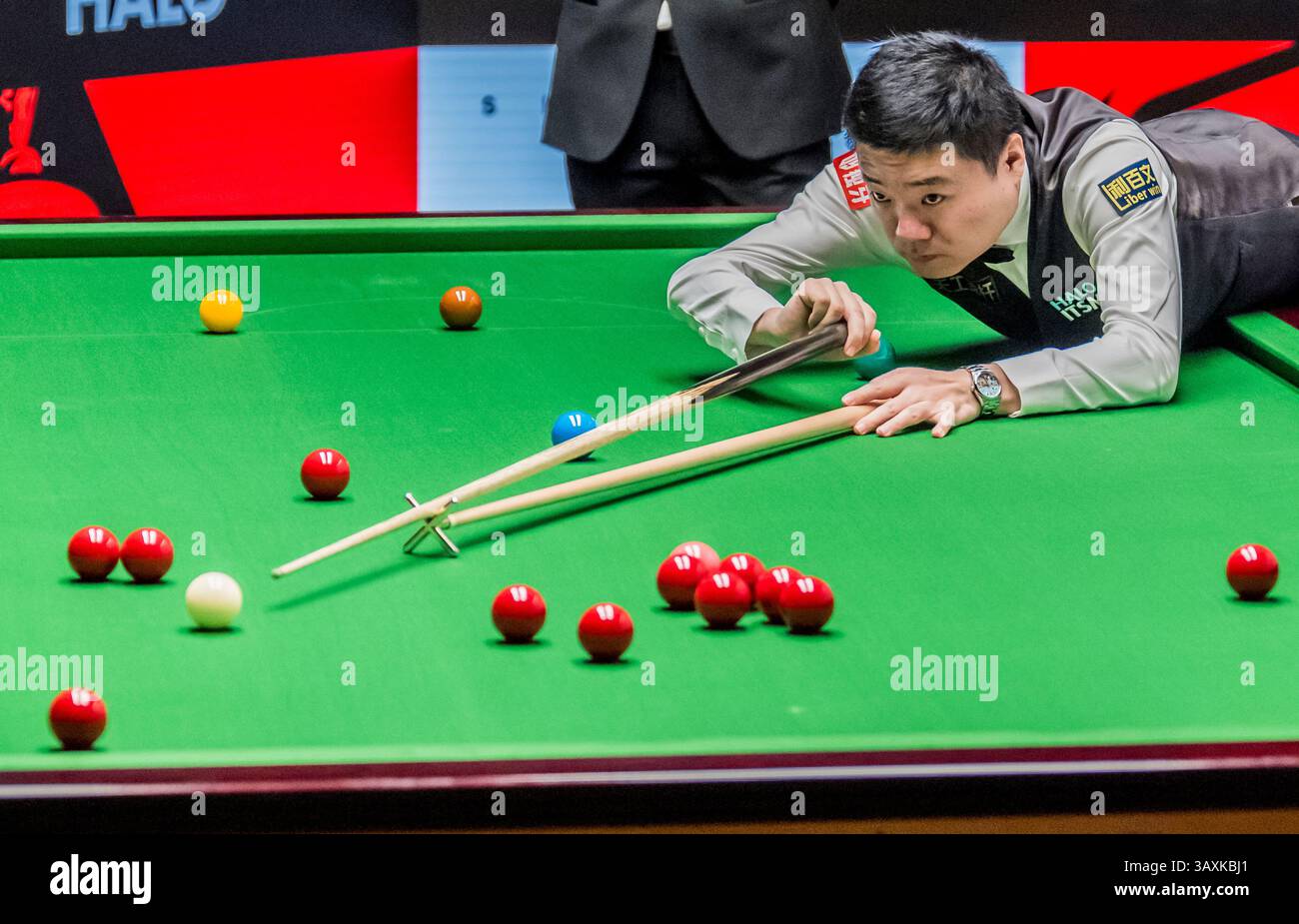 Ding Junhui during his match against Zak Surety (not pictured), during ...