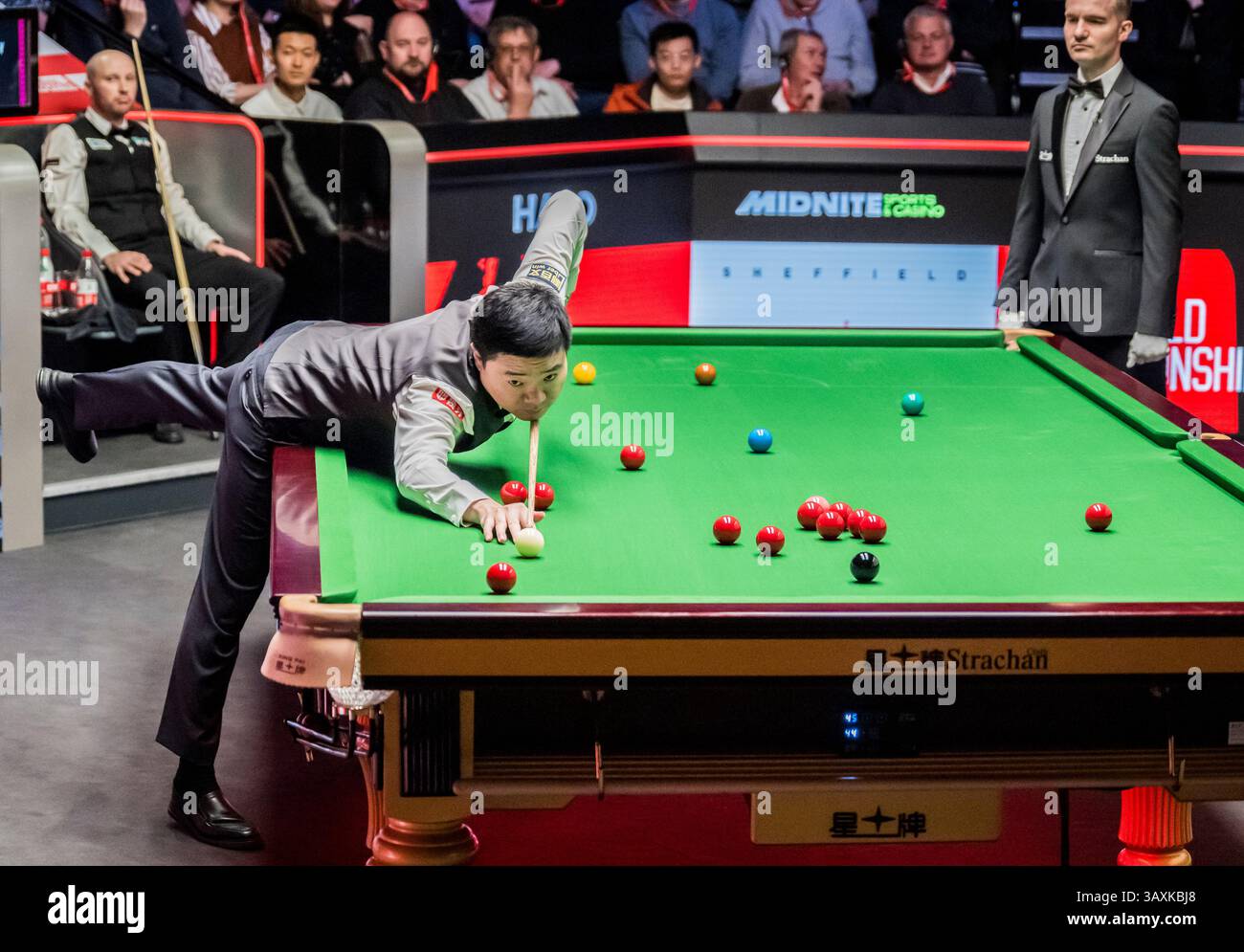Ding Junhui during his match against Zak Surety (not pictured), during ...