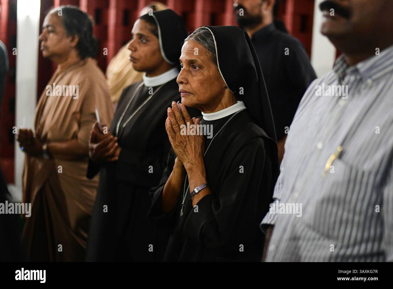 Indian Catholics pray during a prayer meeting for Pope Francis in Kochi ...