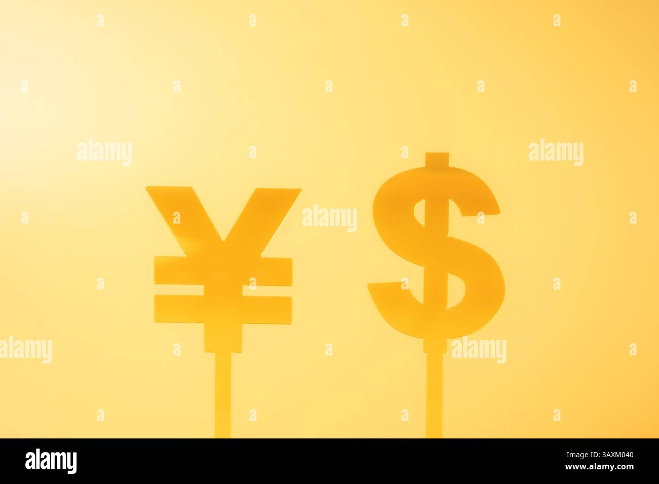 Two yellow currency symbols, the Chinese Yuan (¥) and Dollar ($), set ...