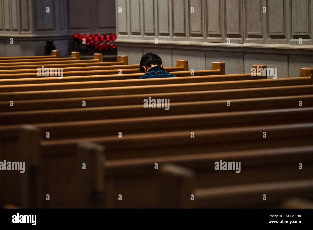 Toronto, Canada. 21st Apr, 2025. A person prays at St. Michael's ...