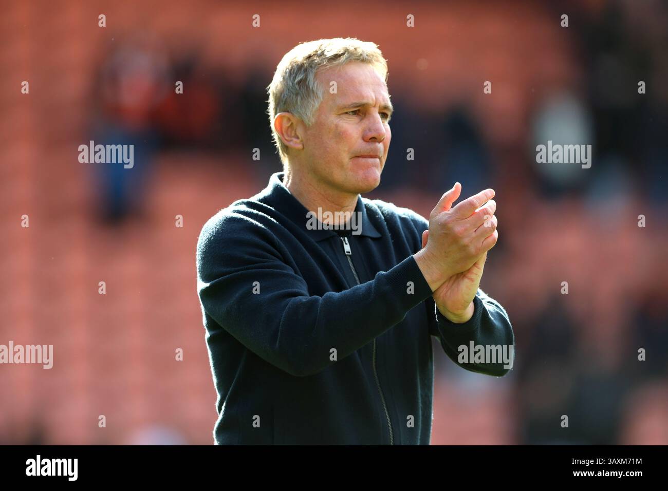 Wrexham manager Phil Parkinson applauds the fans following victory in ...