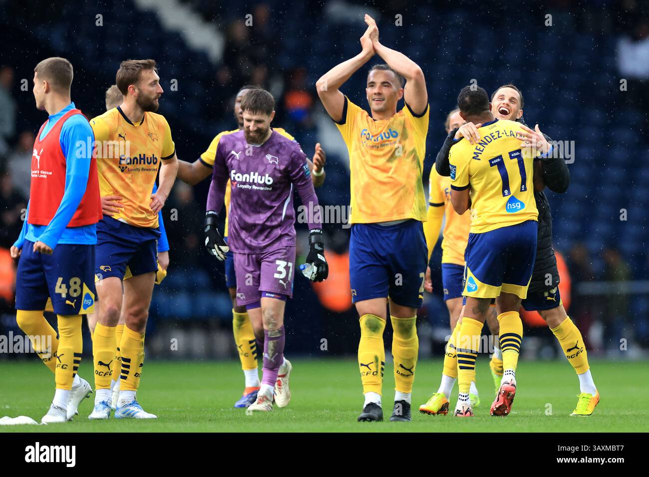 Derby County's Kane Wilson (centre) and team-mates celebrate following ...