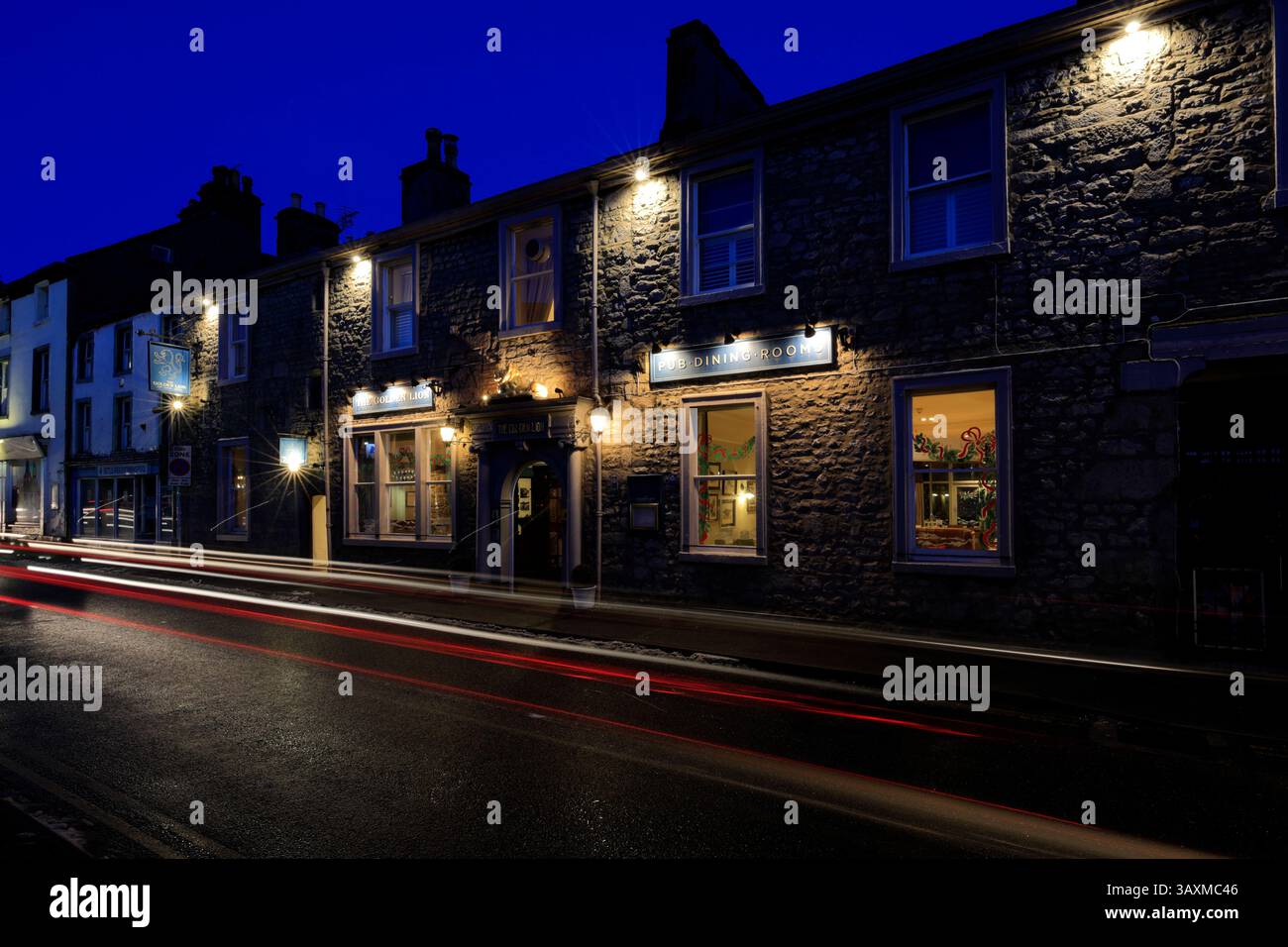 Dusk view of the Golden Lion pub in Settle town, North Yorkshire ...