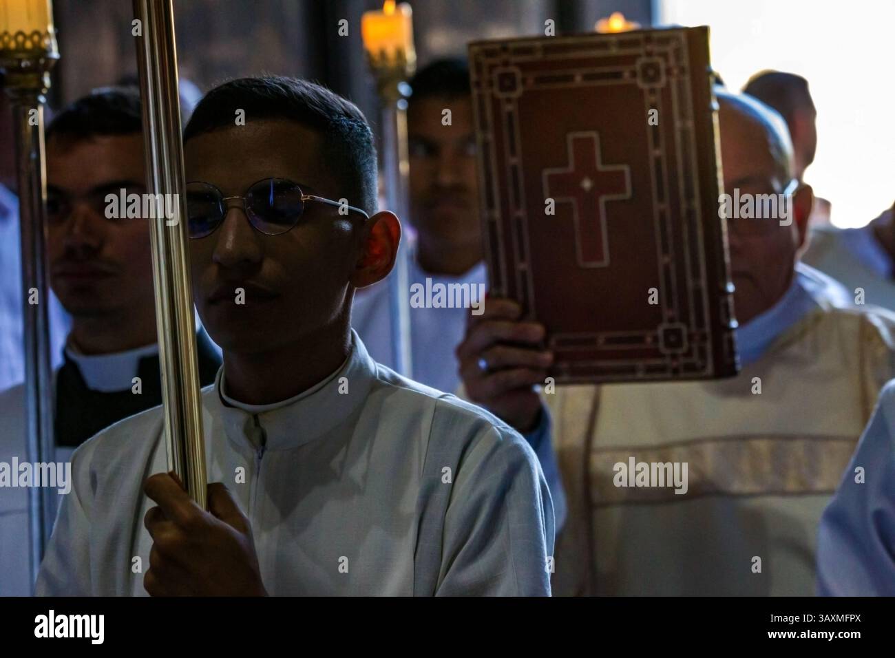 Maracaibo,Venezuela. 15-04-2024. Catholic seminarians hold lit candles ...