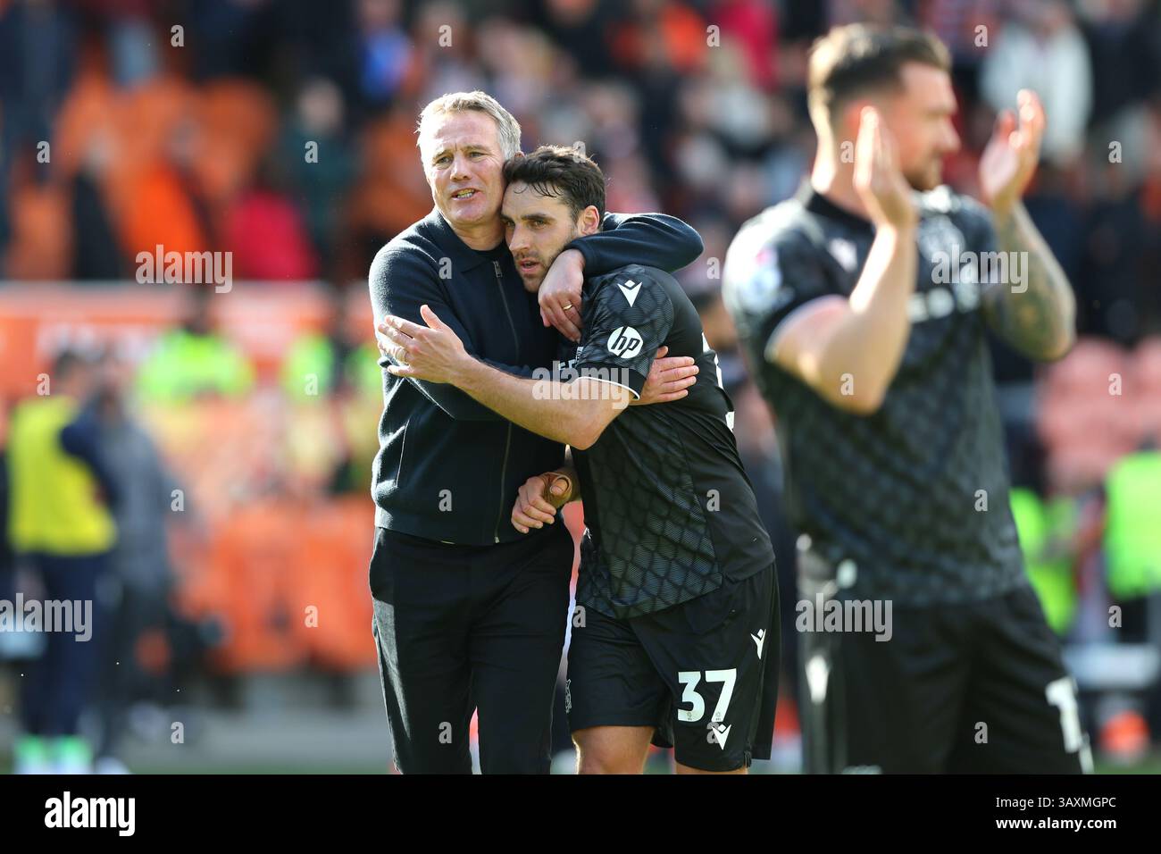 Wrexham manager Phil Parkinson (left) and player Matty James celebrate ...