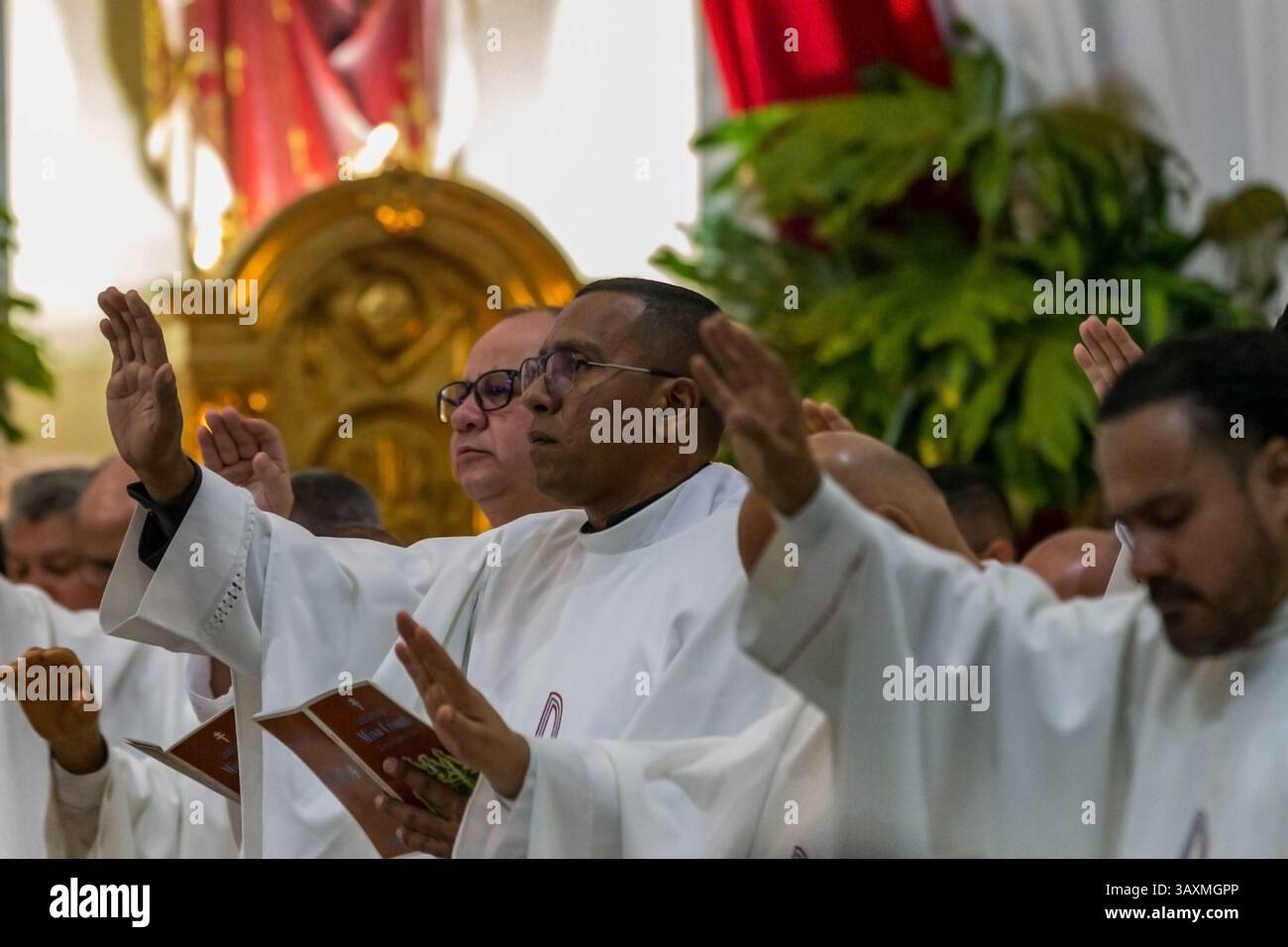 Maracaibo,Venezuela. 15-04-2024. Catholic priests pray in front of the ...
