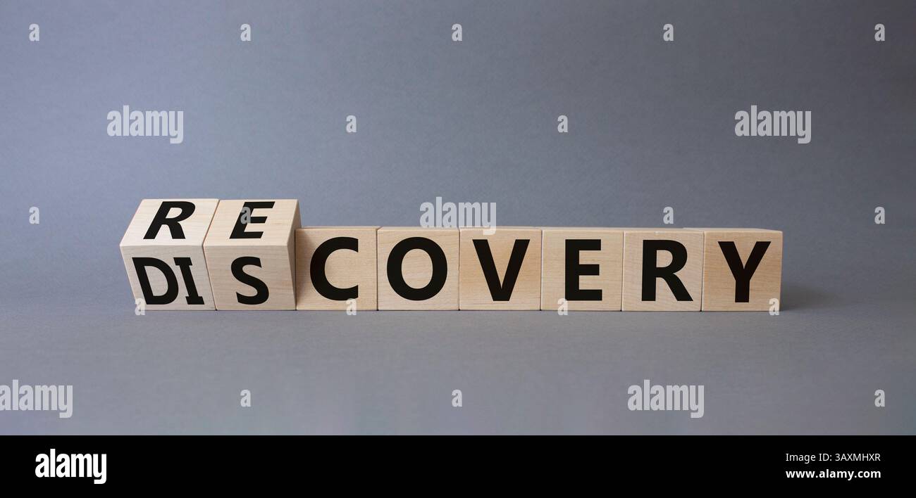Recovery and Discovery. Turned wooden cubes with words Recovery and ...