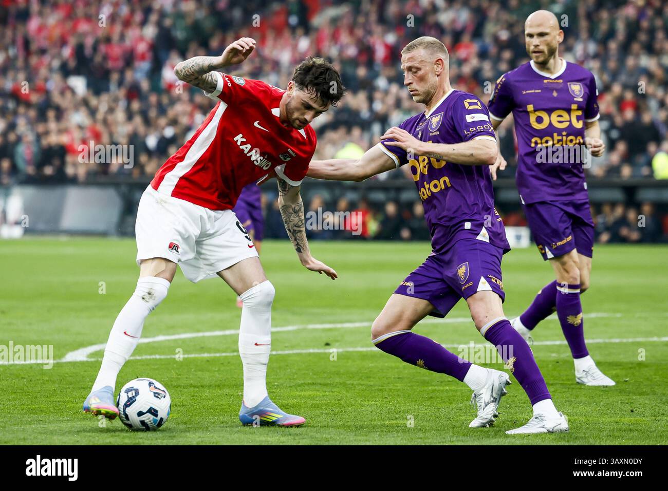ROTTERDAM - (l-r) Troy Parrott of AZ, Joris Kramer of Go Ahead Eagles ...
