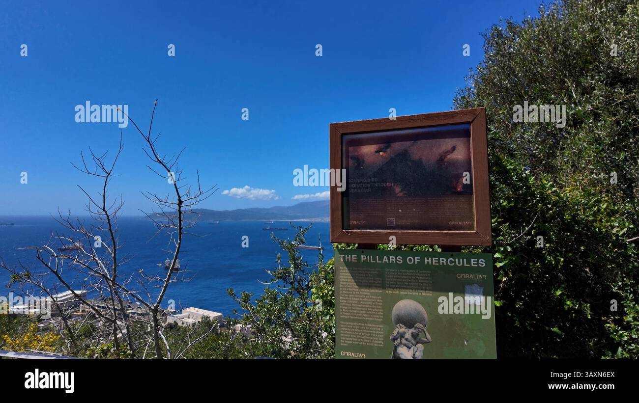 Pillars of Hercules sign with view of cargo ships crossing the Strait ...