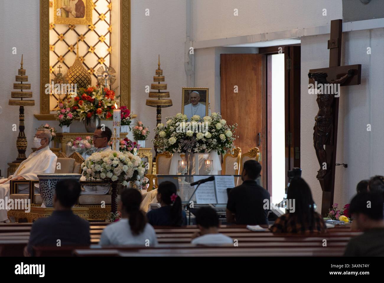 Catholics attend mass at Holy Redeemer Church Bangkok, following the ...