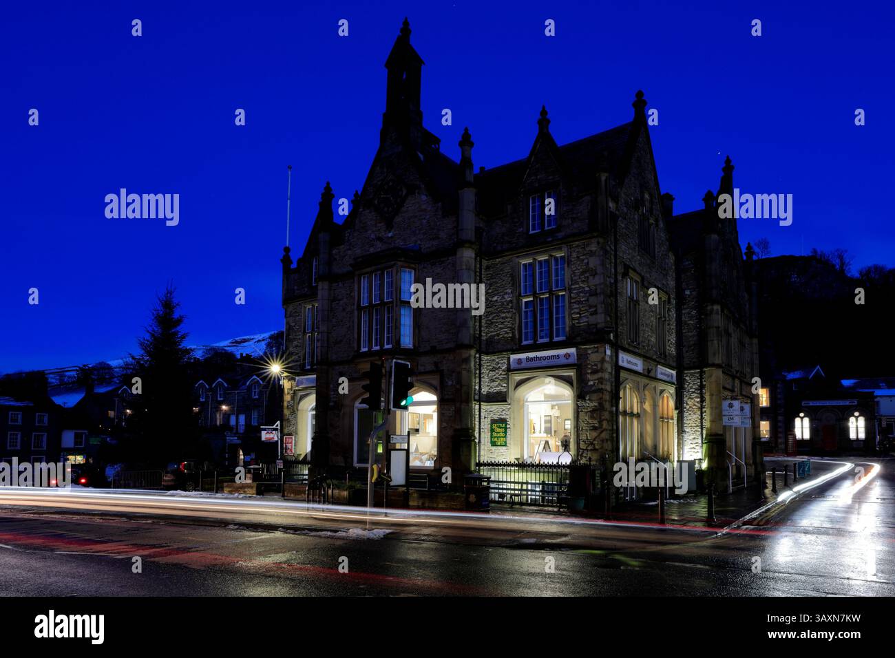 Dusk view of the market square in Settle town, North Yorkshire, England ...