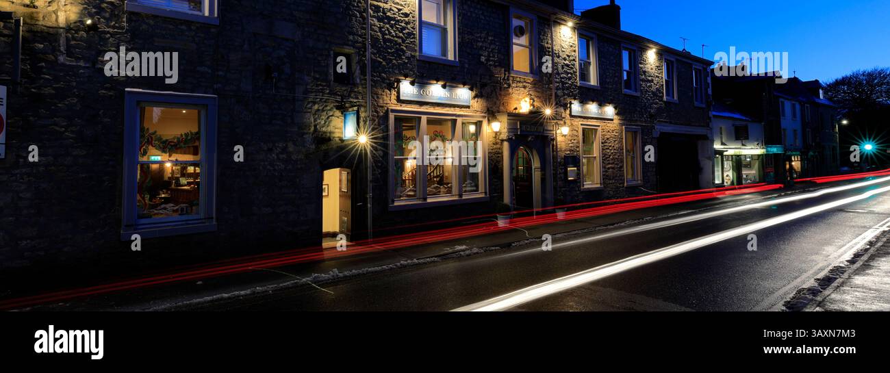 Dusk view of the Golden Lion pub in Settle town, North Yorkshire ...
