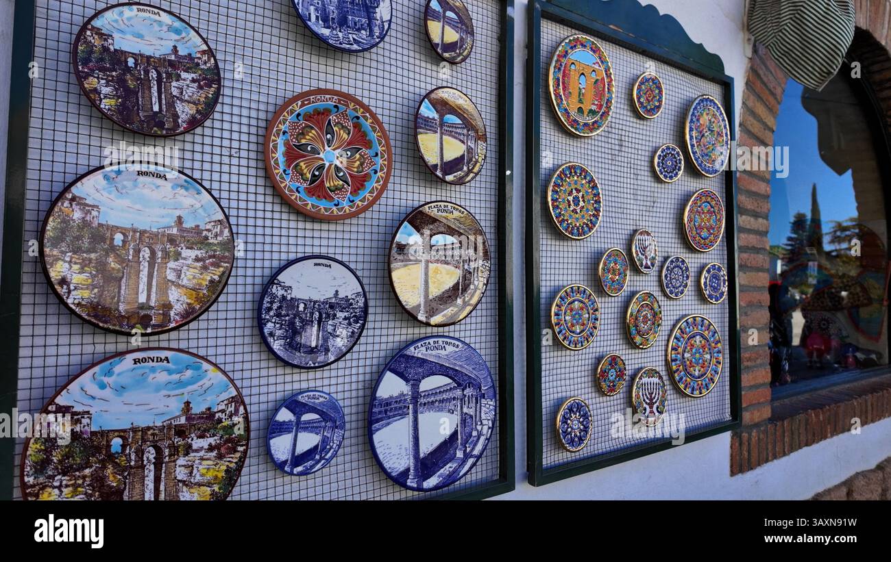 Souvenir plates with images of Ronda's Puente Nuevo bridge and Plaza de ...