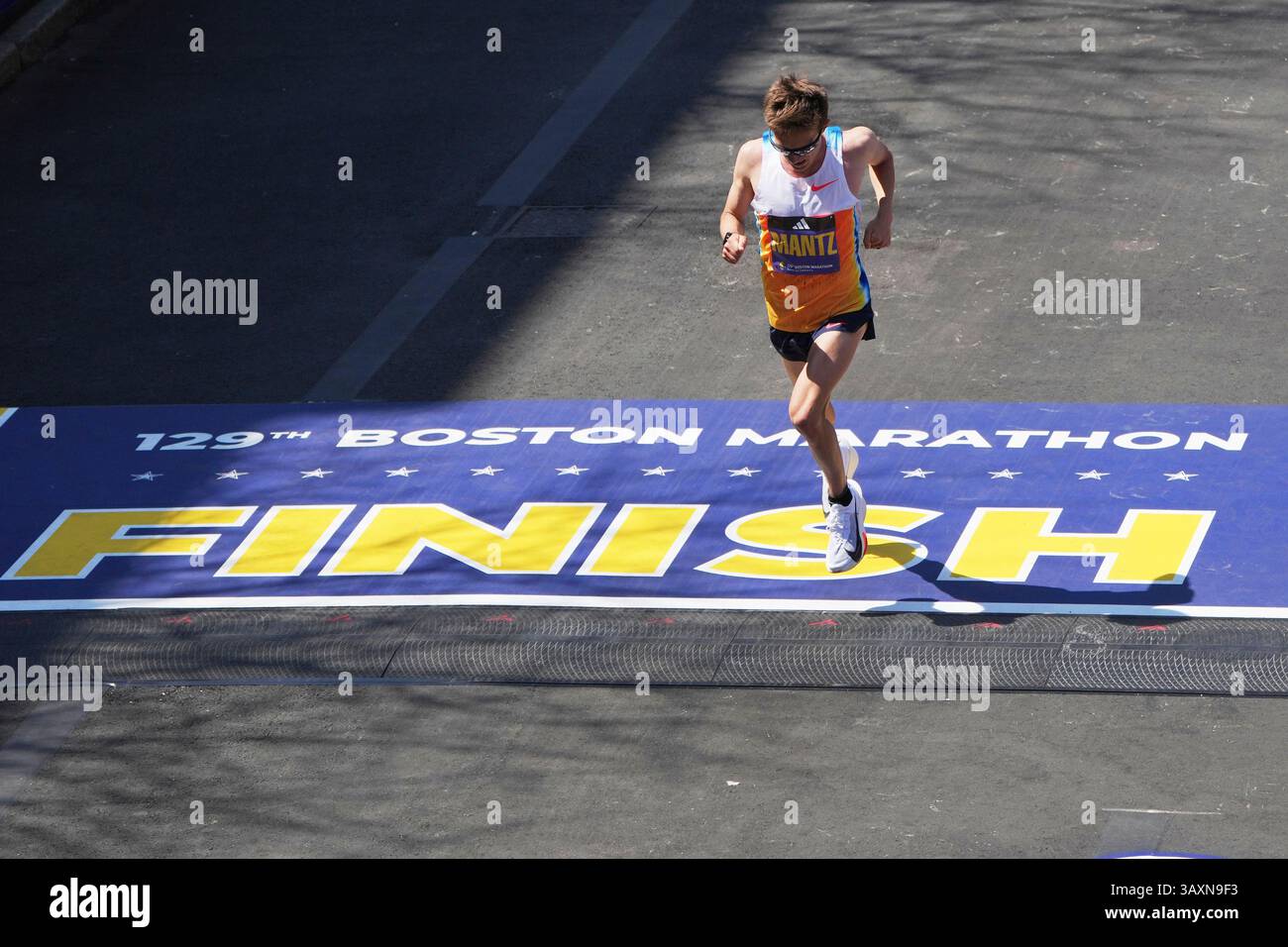 Conner Mantz, of the United States, crosses the finish line in fourth ...