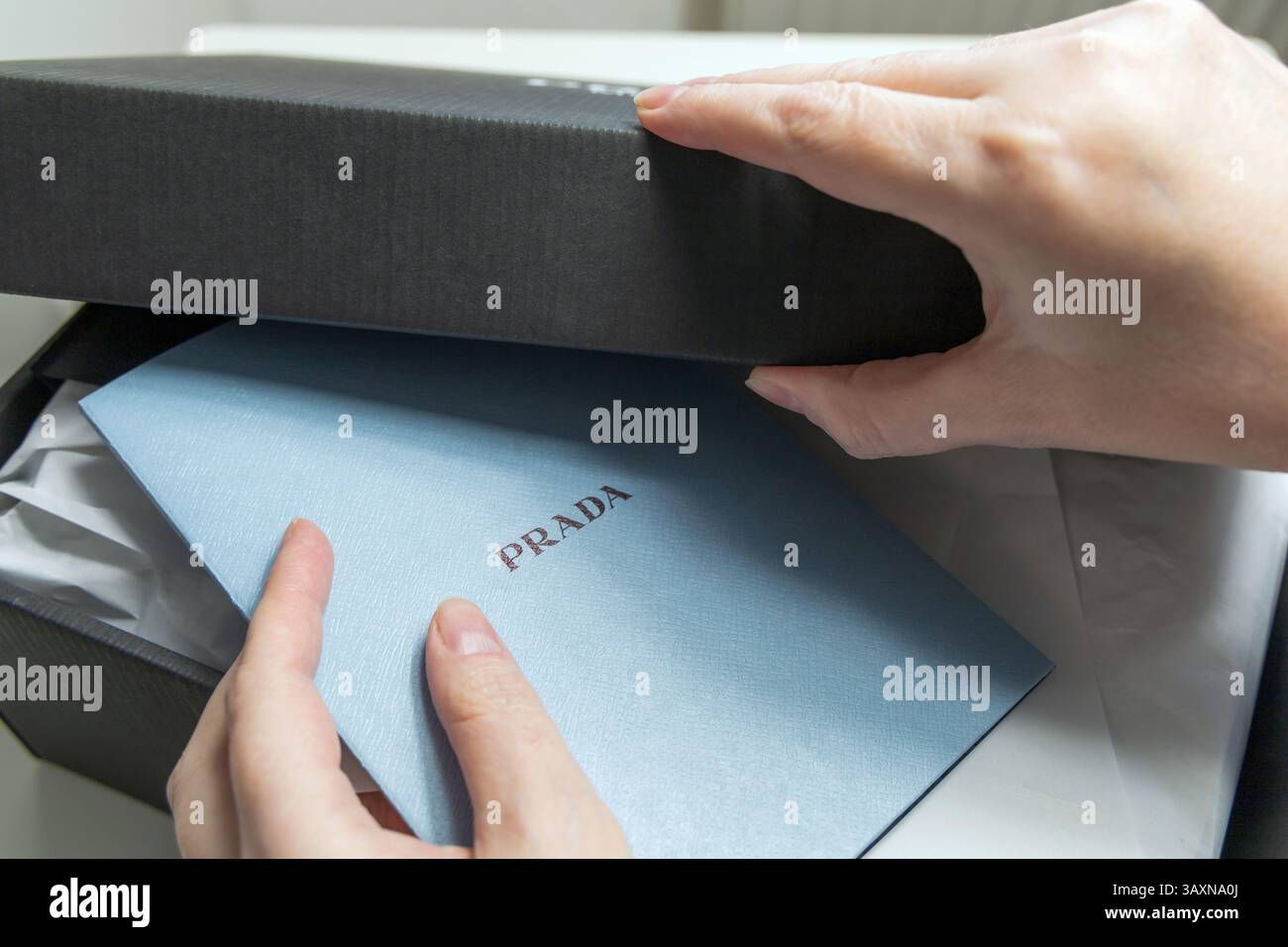 Unpacked parcel with shoes from Prada. Copenhagen, Denmark - April 21, 2025 Stock Photo - Alamy