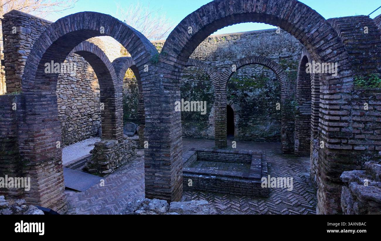 Ancient arab baths in Ronda, Spain, featuring arches, brick walls, a ...