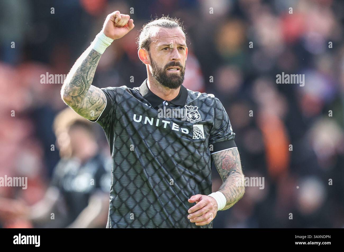 Steven Fletcher of Wrexham celebrates the win during the Sky Bet League ...