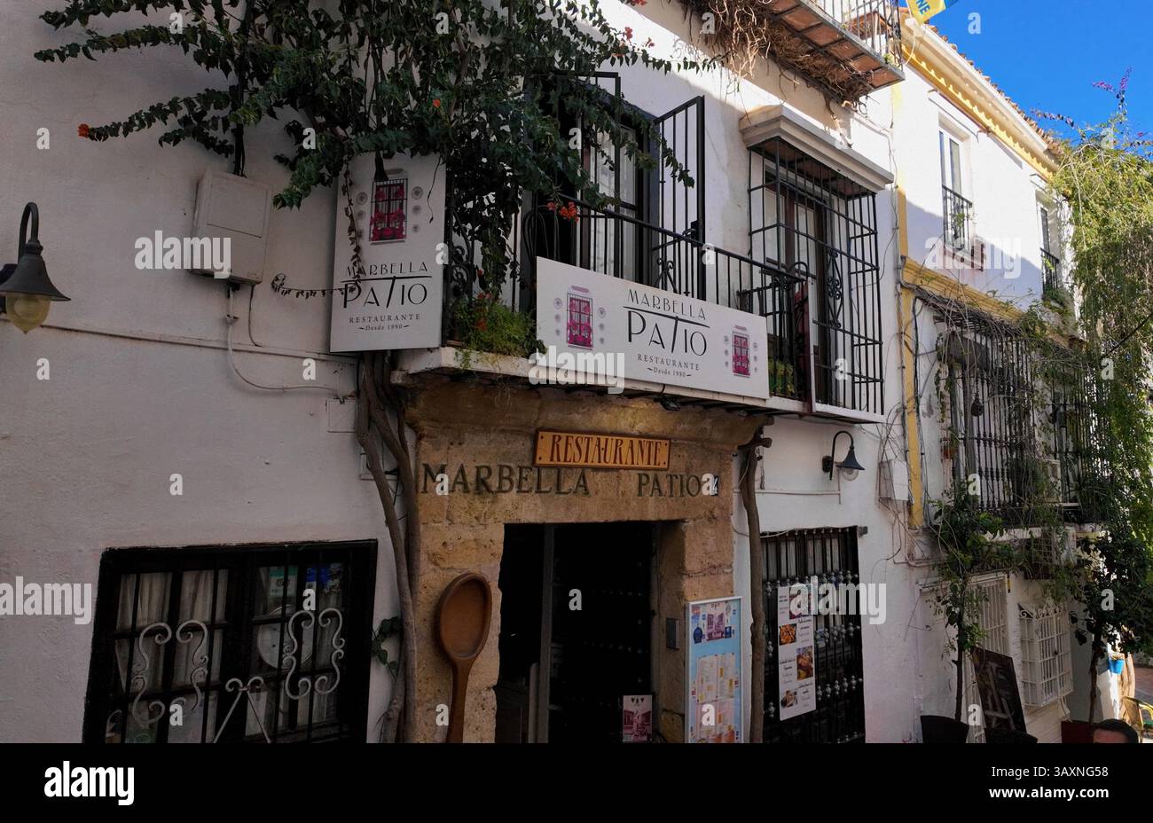 Traditional spanish restaurant Marbella Patio with wooden spoon ...