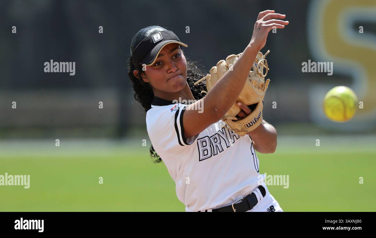 Bryant infielder Arlisenny Rodriguez (1) throws the ball before an NCAA ...