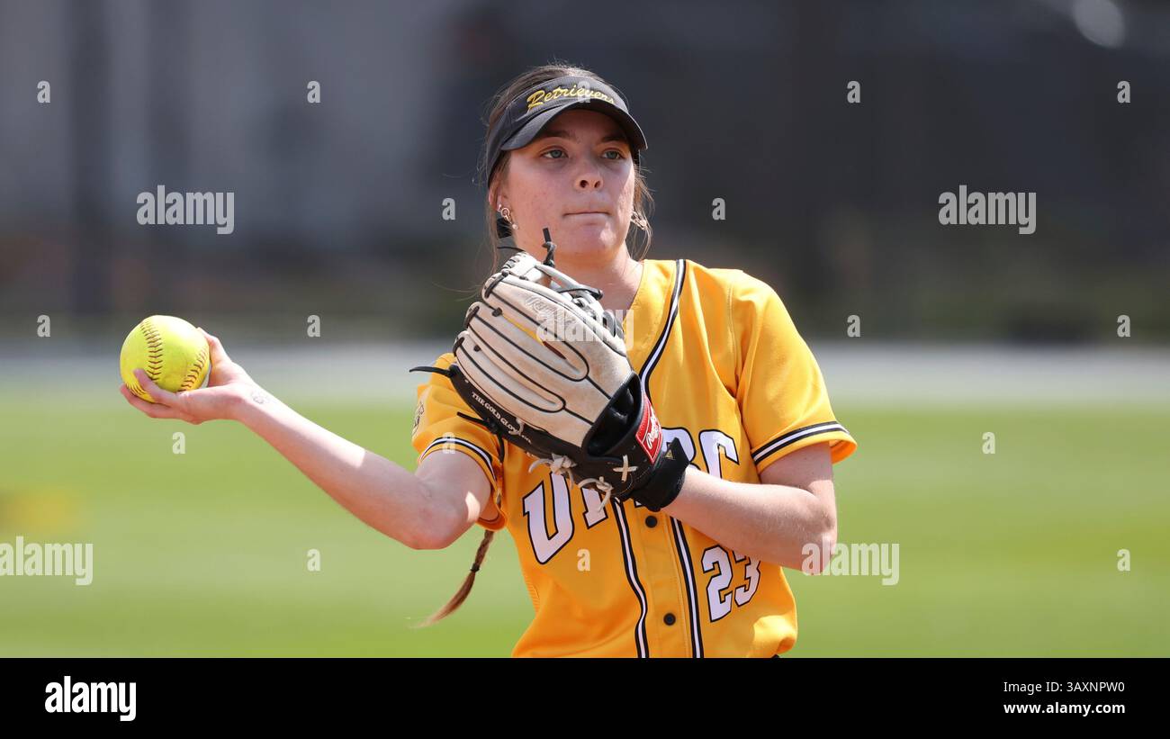 UMBC infielder Phoebe Florian (23) throws the ball before an NCAA ...