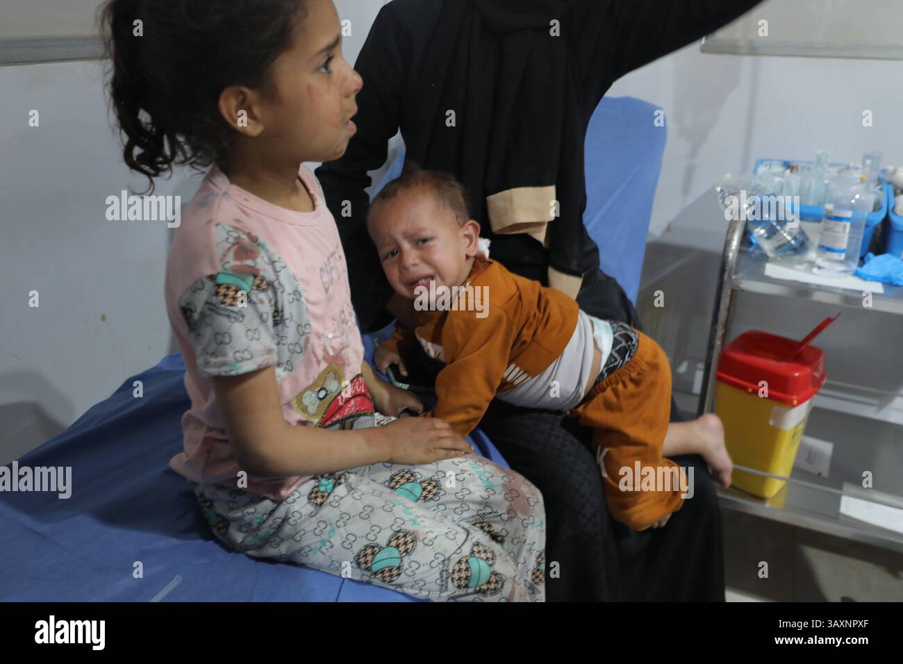 Wounded people, including children are brought to Al-Awda Hospital in ...