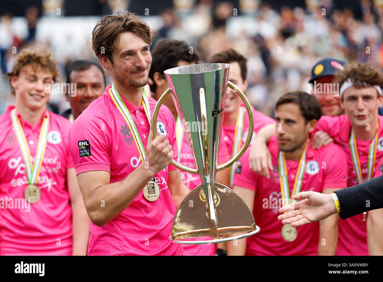 DEN BOSCH - Hockey player Antoine Kina of Gantoise with the cup during ...