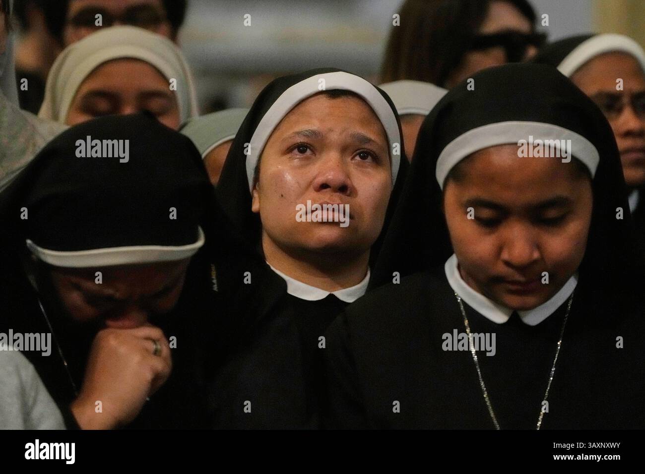 Nuns attend a Mass for the late Pope Francis, at the St. John Lateran ...