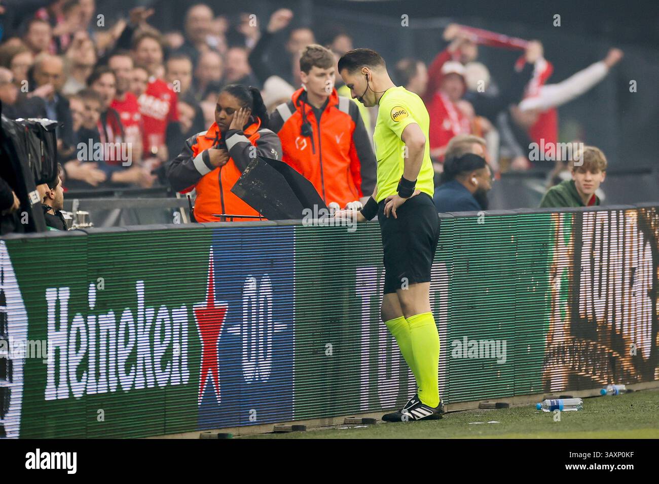 ROTTERDAM - Referee Danny Makkelie watches video footage during the ...