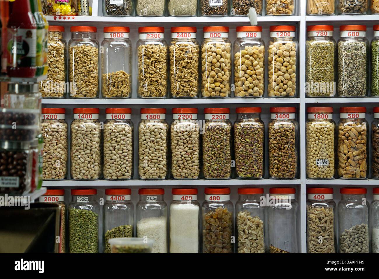 market stall in mumbai selling dried nuts Stock Photo - Alamy