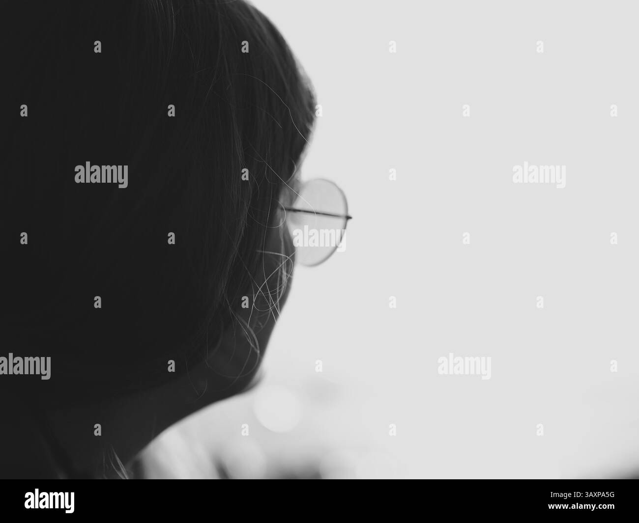 A Thoughtful Individual Captured in Black and White Imagery and ...