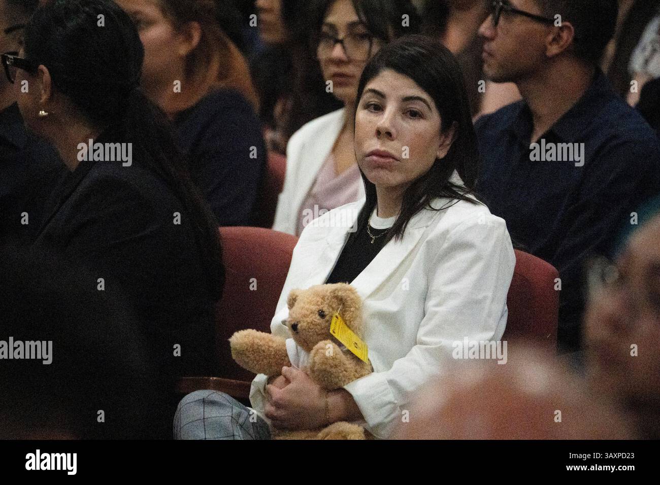 Family members await the start of the sentencing for Patrick Crusius ...