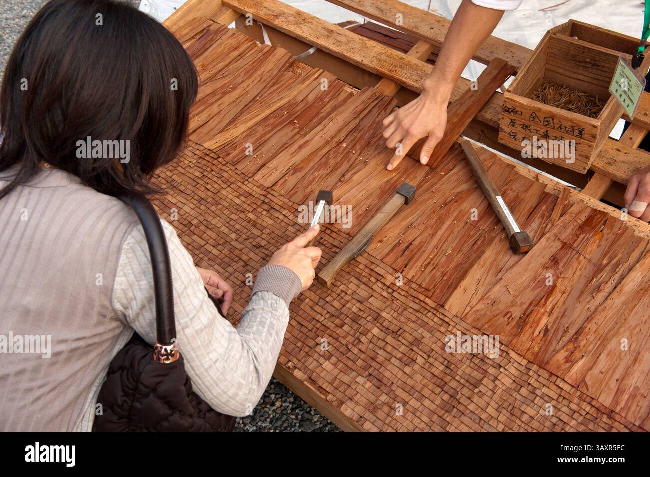 Hands-on practice of traditional cedar bark roof shingles for Japanese ...