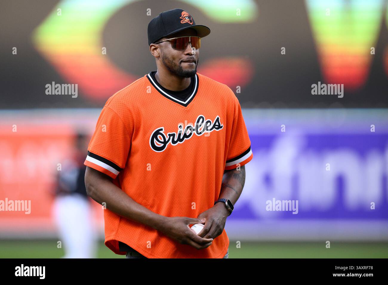 Former NBA basketball player Rudy Gay prepares to throw out a ...