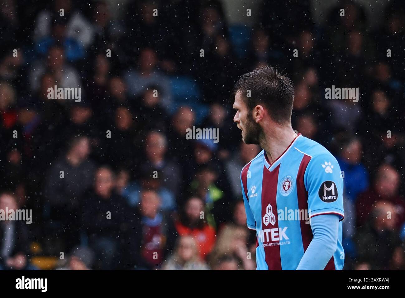 Scunthorpe , United Kingdom . 21 April, 2025. Joe Rowley walking as the ...