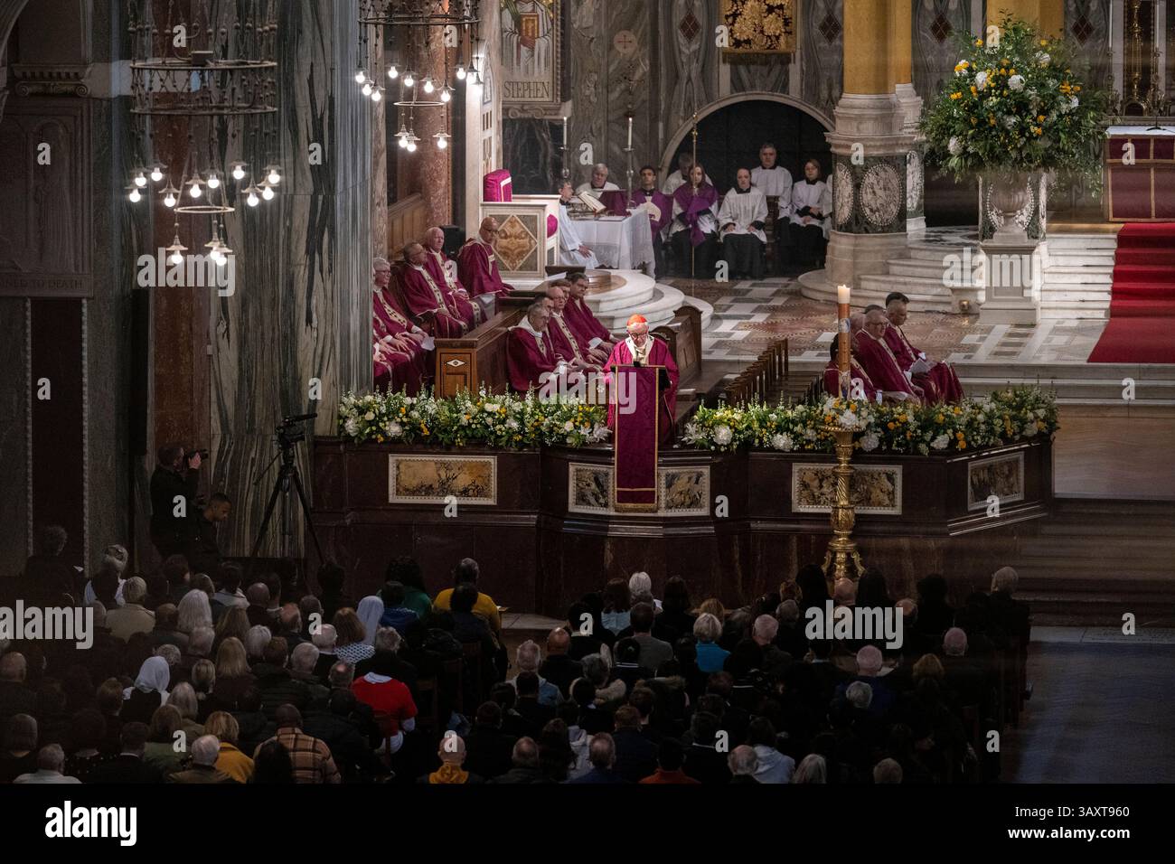 London, UK. 21 April 2025. People attend a Requiem Mass celebrated by ...