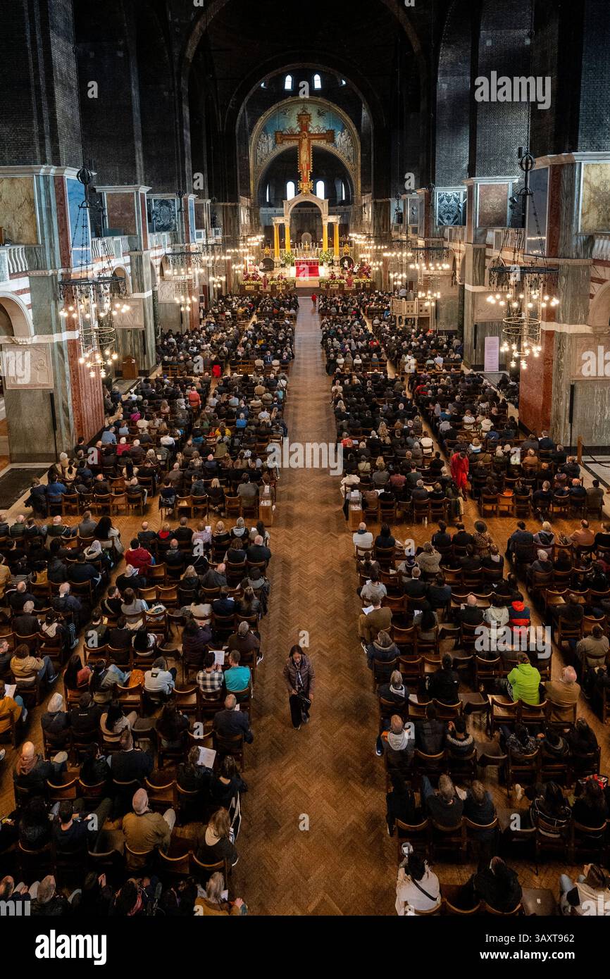 London, UK. 21 April 2025. People attend a Requiem Mass celebrated by ...
