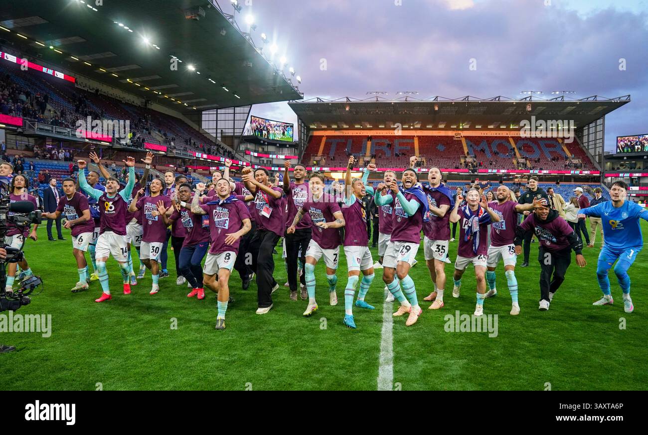 Burnley, UK. 21st Apr, 2025. Burnley players celebrates promotion to ...