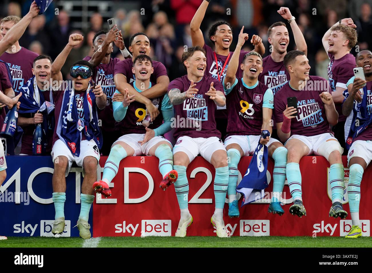 Burnley's players celebrate promotion to the Premier League on the ...