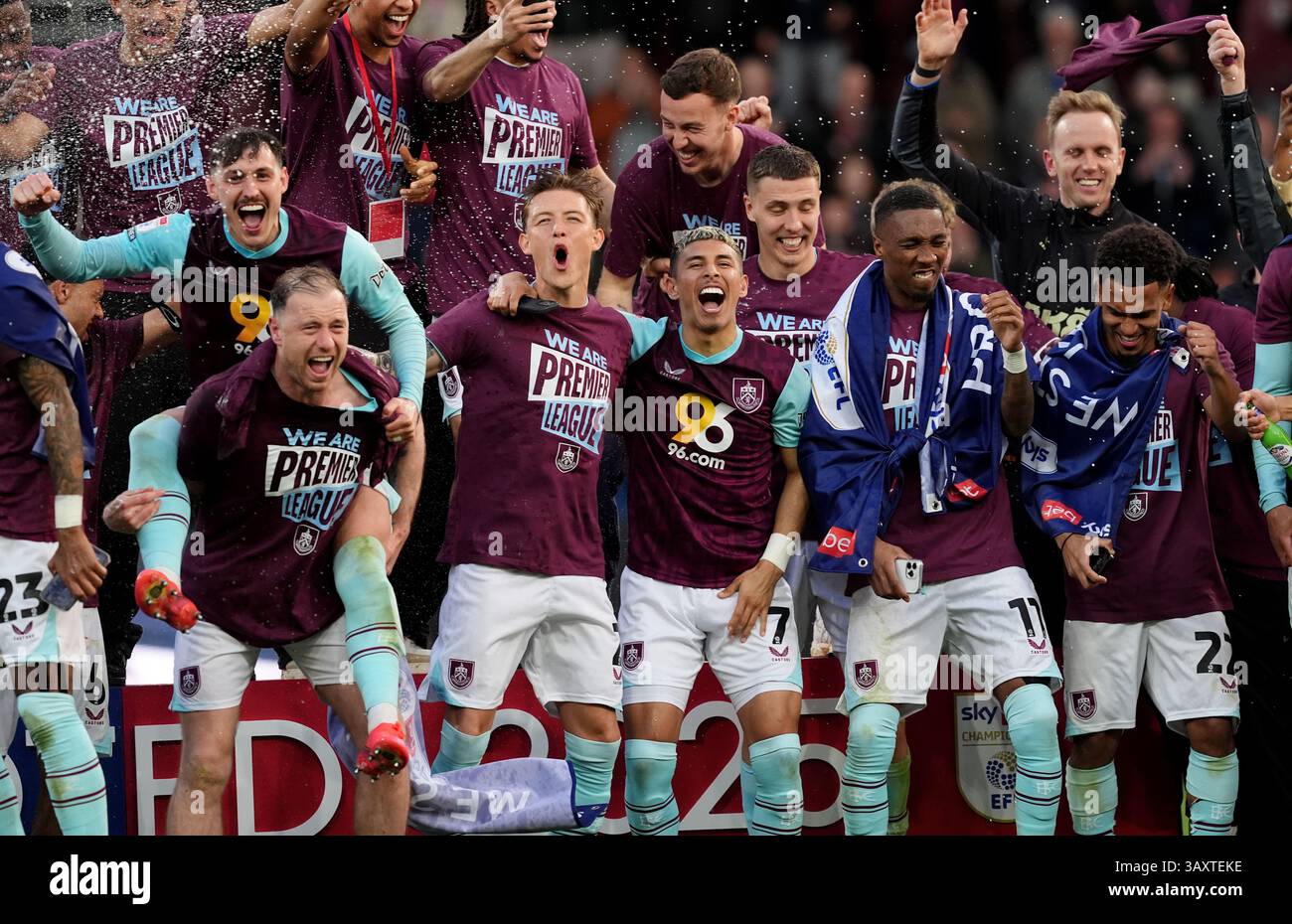 Burnley's players celebrate promotion to the Premier League on the ...